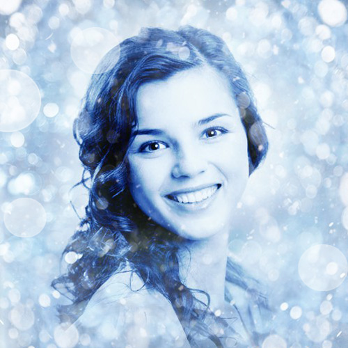 Blue snow bokeh effect adds blue glitter background to photo